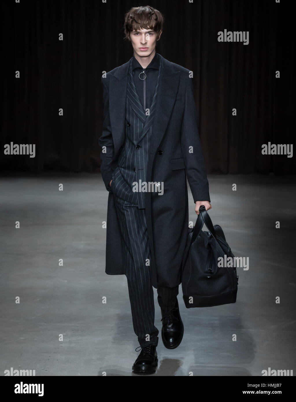 NEW YORK, NY - January 31, 2017: Dylan Fender walks the runway at the ...