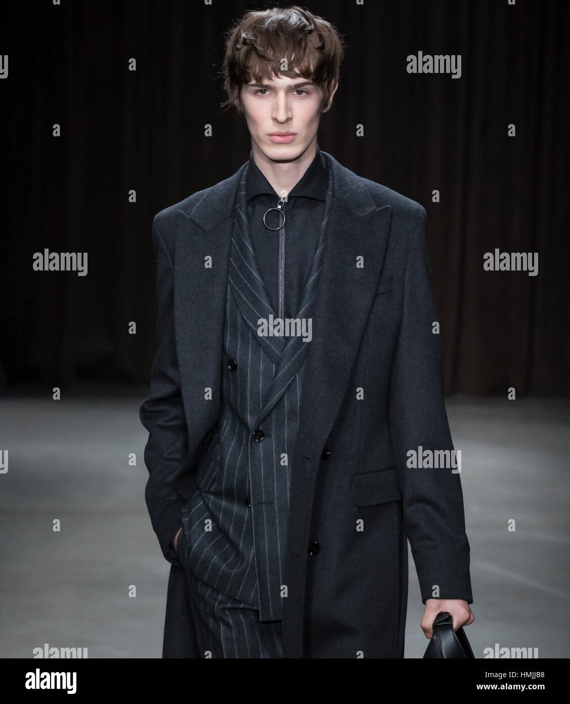 NEW YORK, NY - January 31, 2017: Dylan Fender walks the runway at the ...