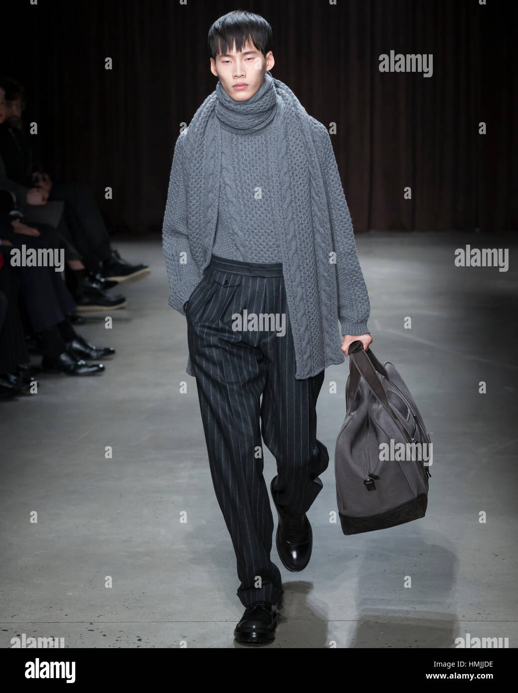NEW YORK, NY - January 31, 2017: Wang Chenming walks the runway at the ...