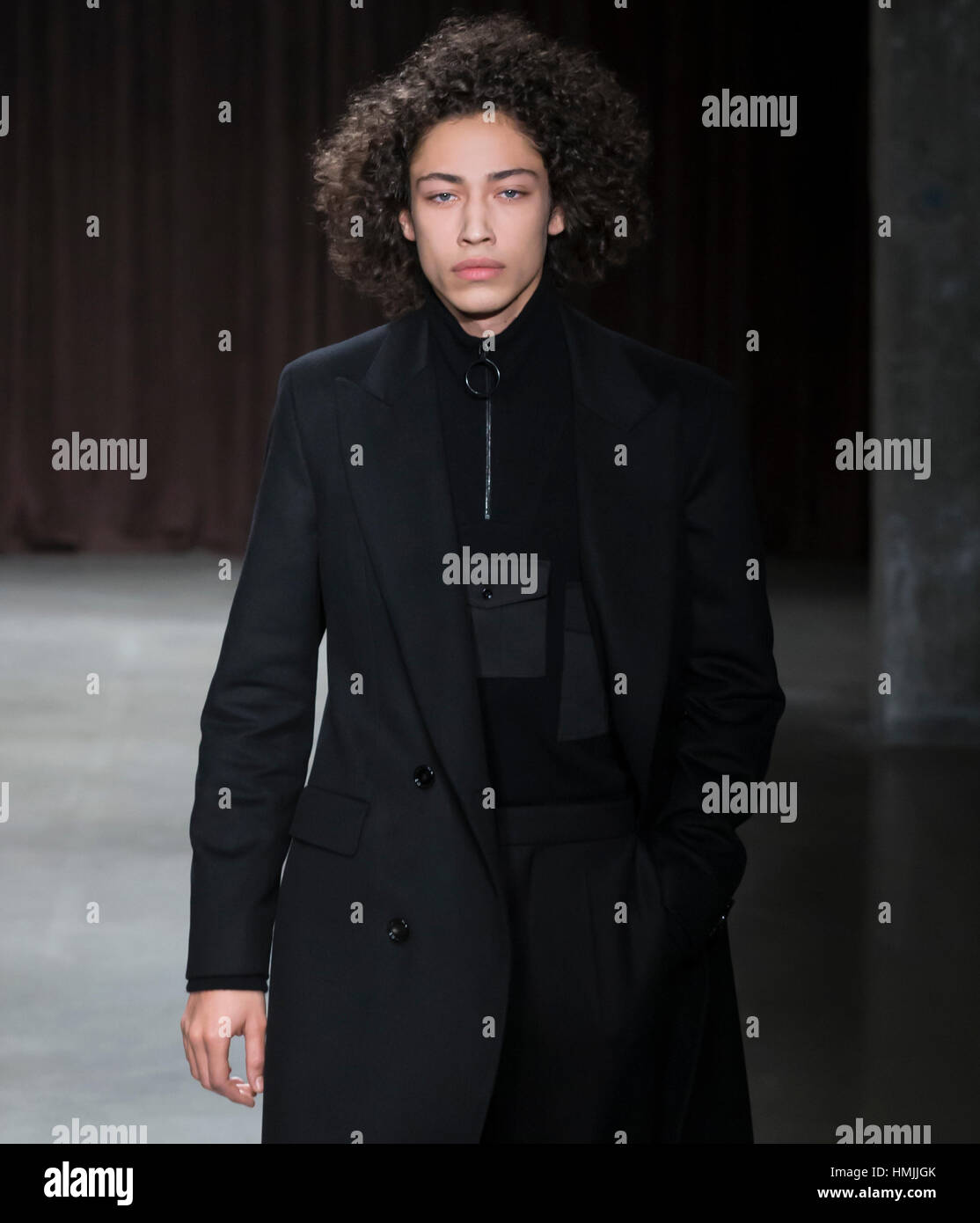 NEW YORK, NY - January 31, 2017: Max Fieschi walks the runway at the ...