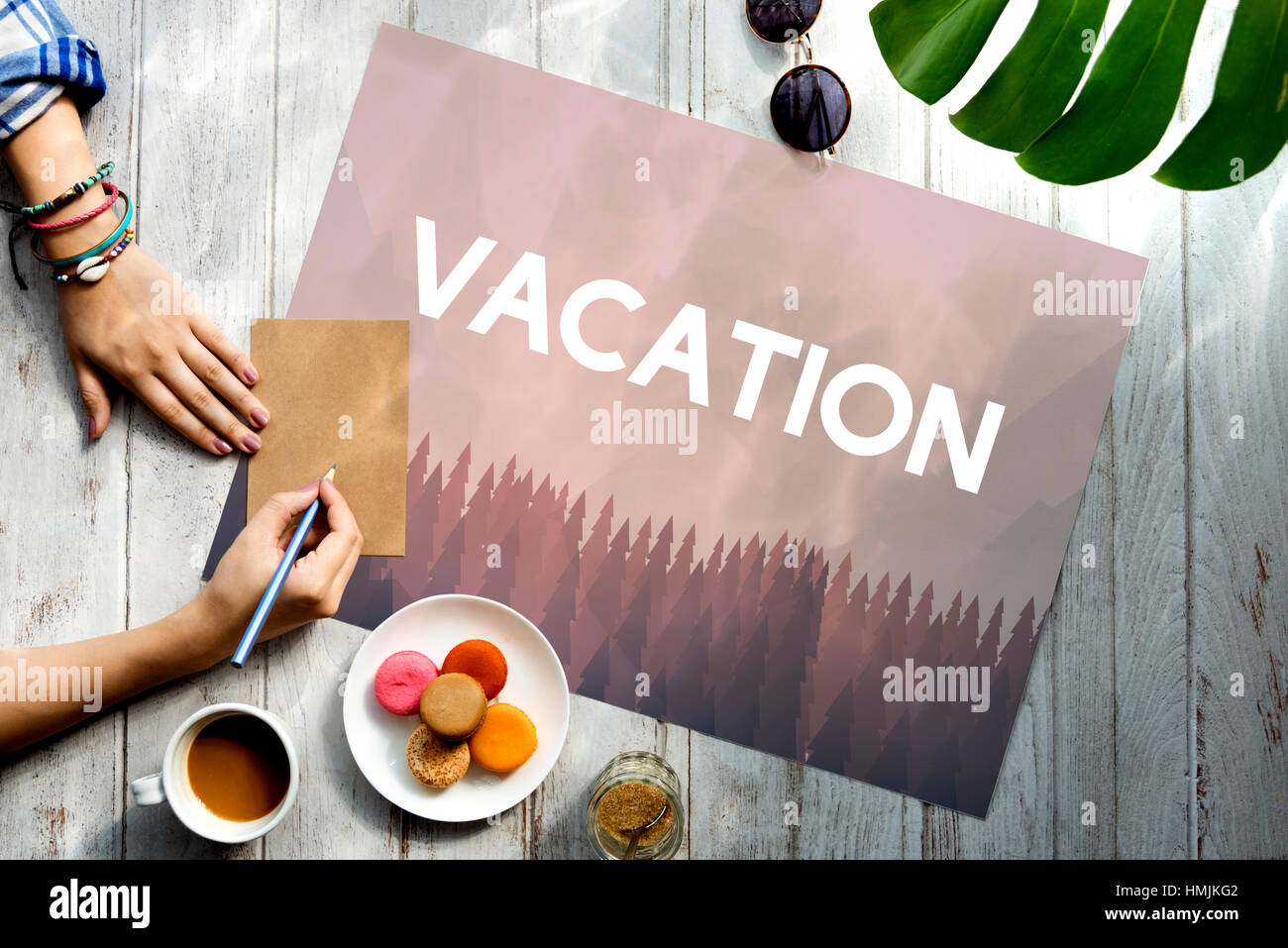 Vacation word on nature background with trees Stock Photo - Alamy