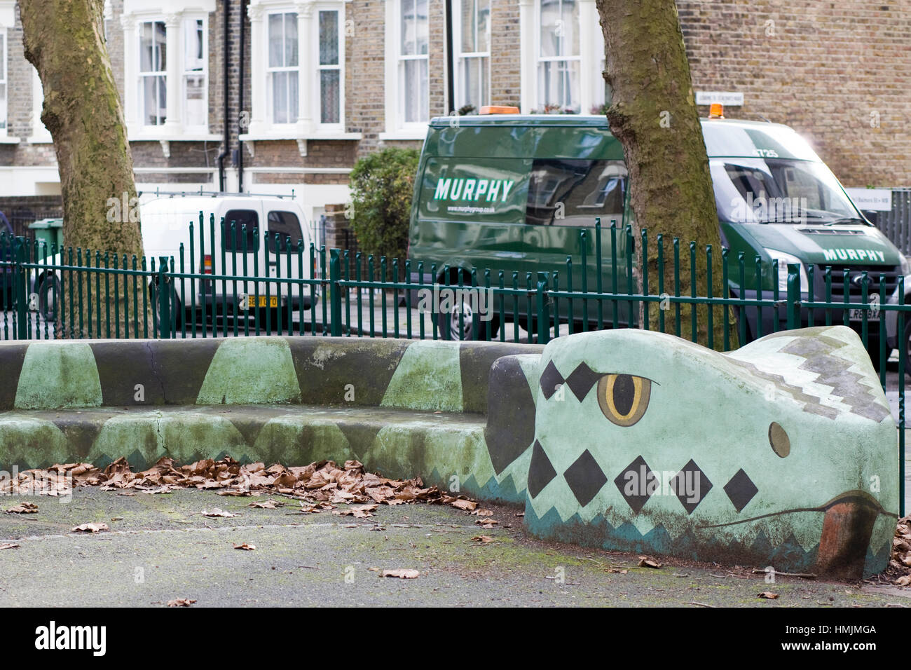 large snake shaped seating in a children's playground in London Stock ...