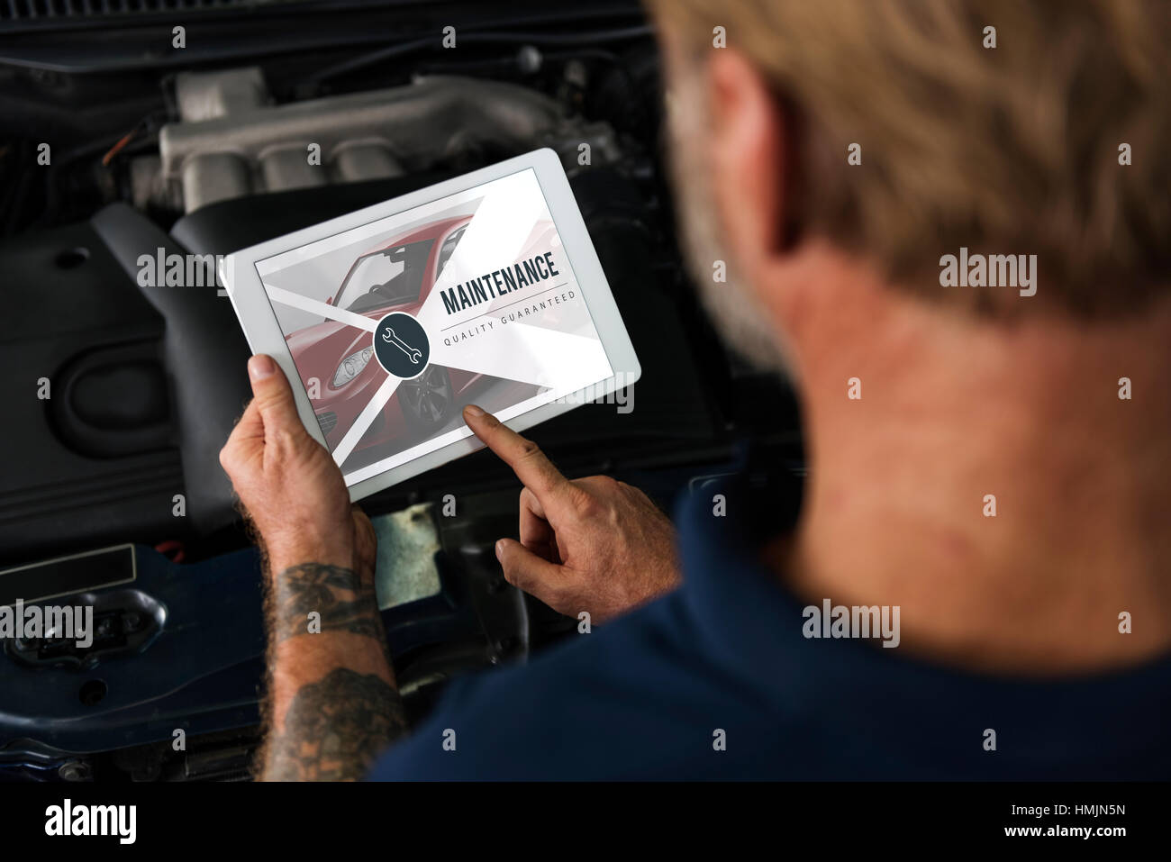 Auto Repair Shop Owner Checking Tablet Concept Stock Photo - Alamy