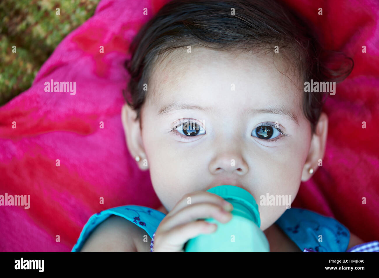 small baby drink milk view from top Stock Photo - Alamy