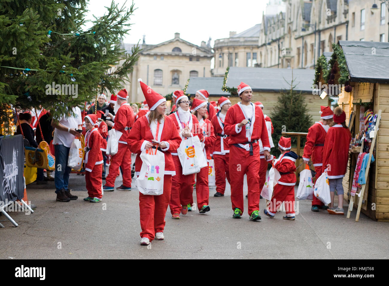 Charity Santa Run in Oxford city centre Stock Photo - Alamy