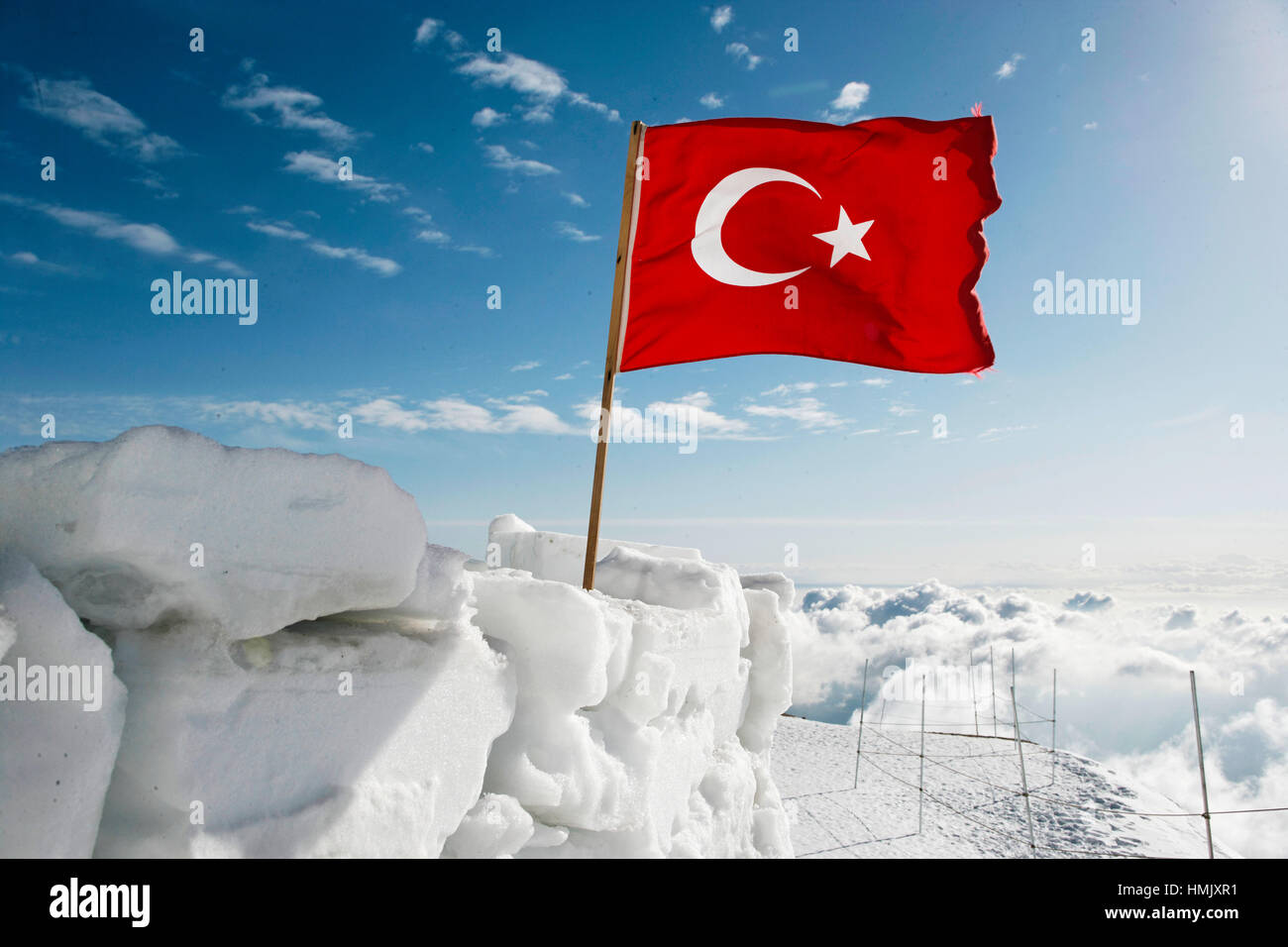Turkish flag in the snow, mountain Tahtali, Taurus Mountains, Kemer ...