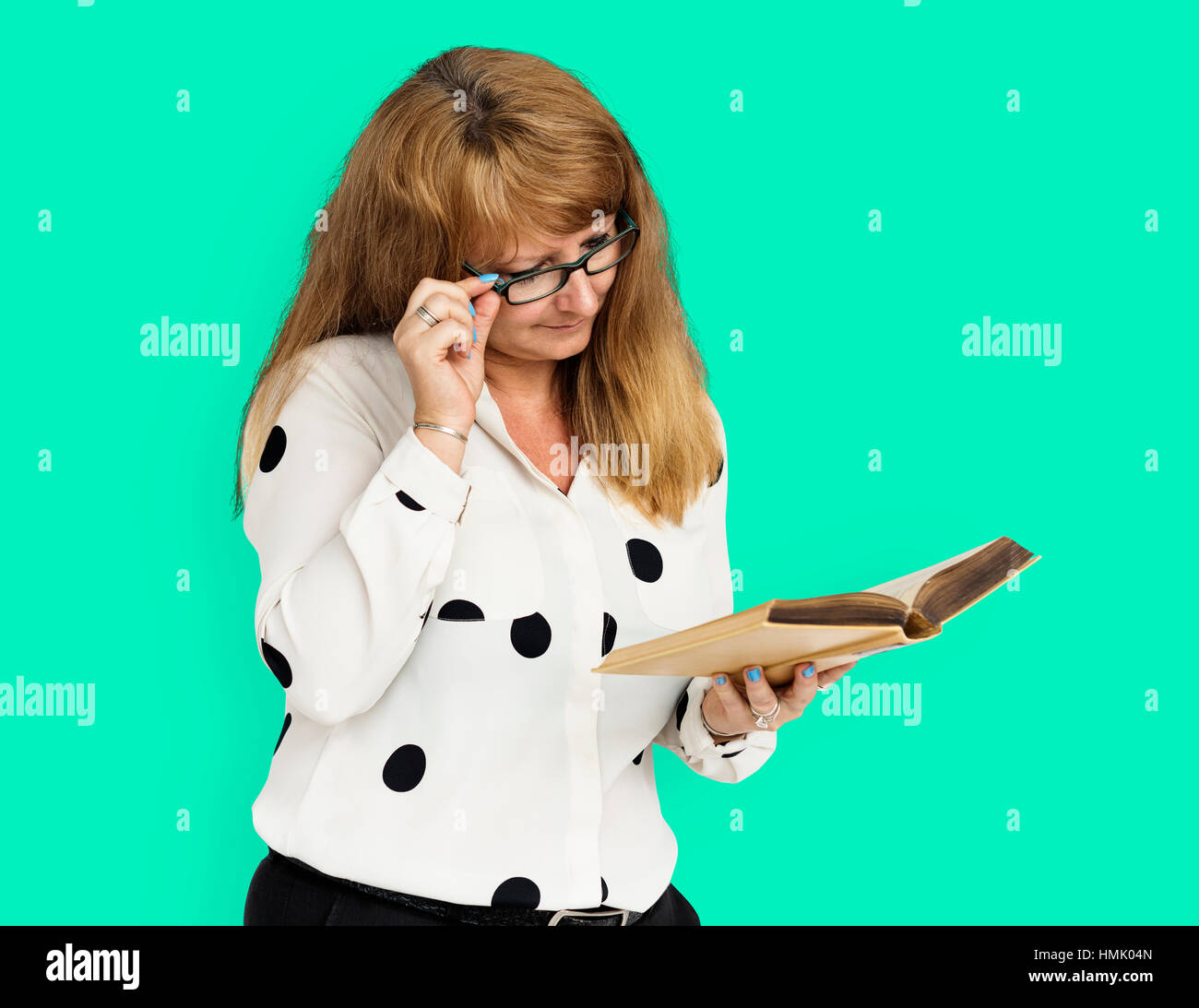 Mature Business Lady Reading Book Concept Stock Photo - Alamy