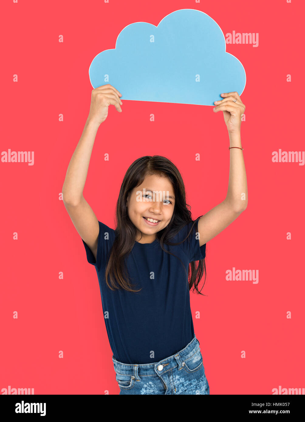 Cheerful Little Girl Holding Cloud Concept Stock Photo - Alamy