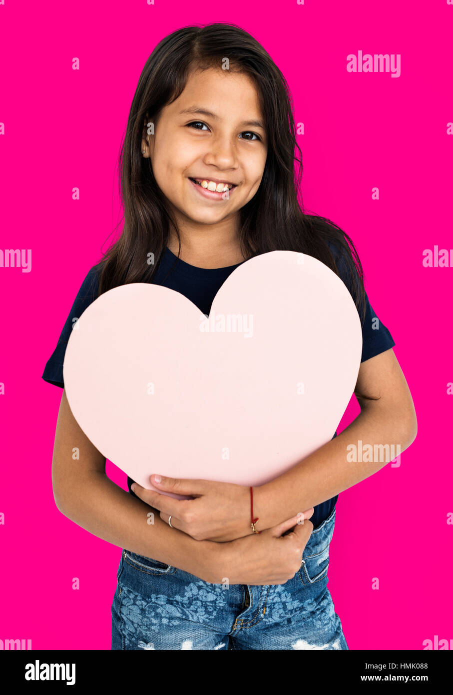 Little Girl Carrying Heart Concept Stock Photo - Alamy