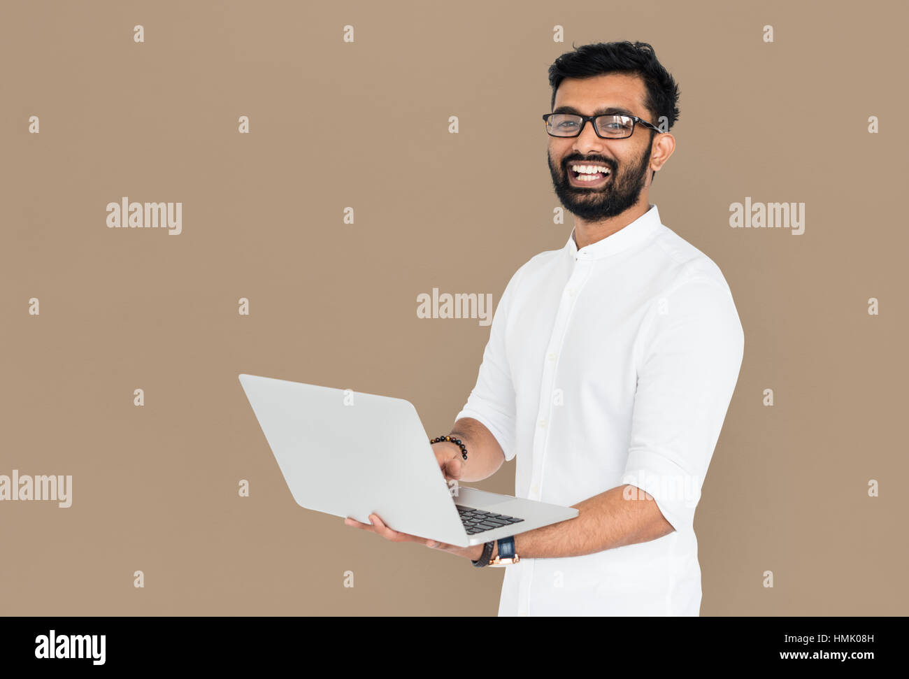 Cheerful Man Technology Gadget Concept Stock Photo - Alamy