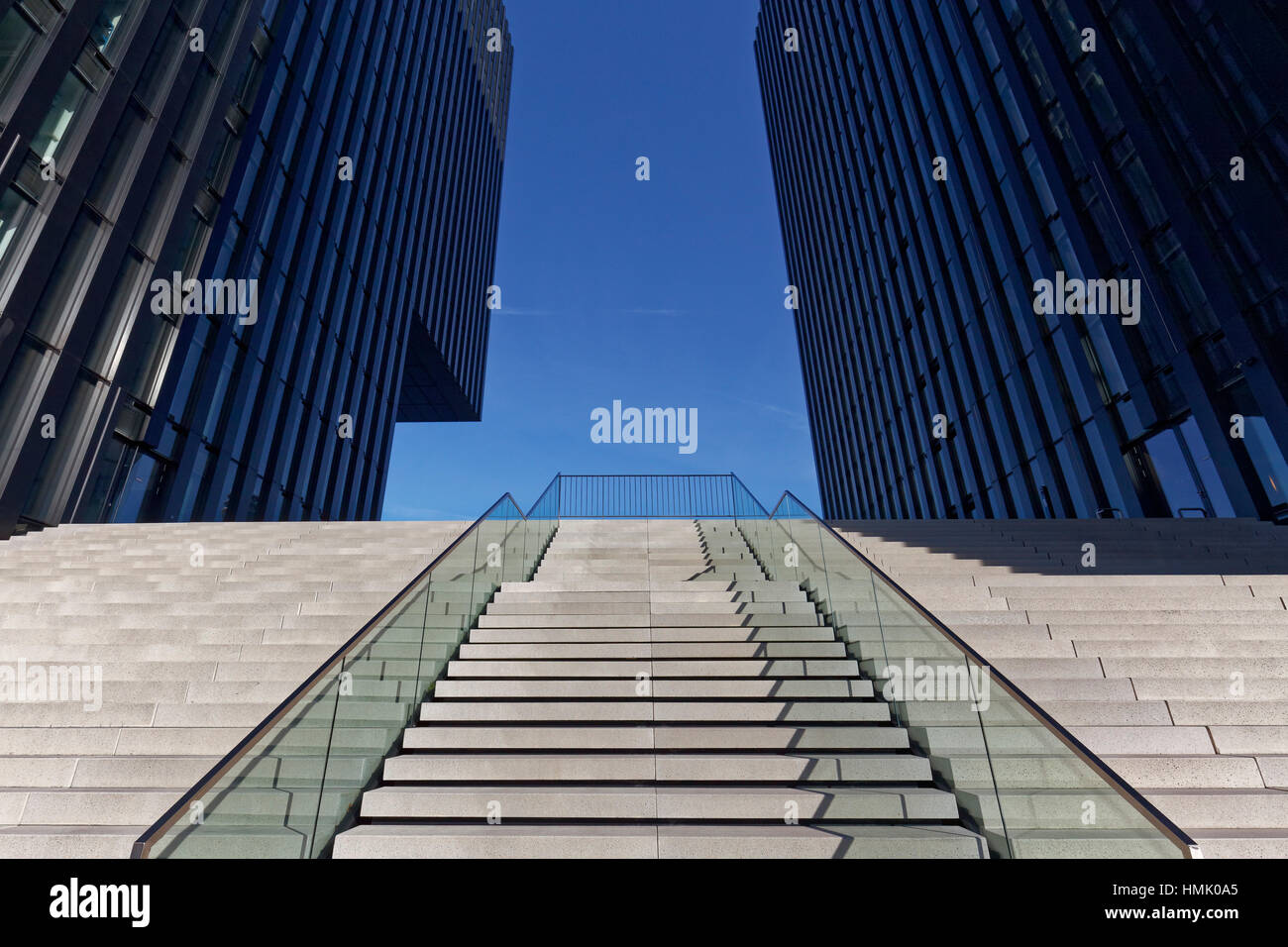 Wide staircase leading upwards between skyscrapers, Media Harbour ...