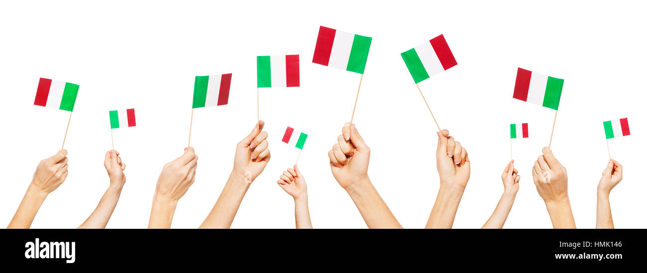 Hands holding the national flags of Italy Stock Photo - Alamy