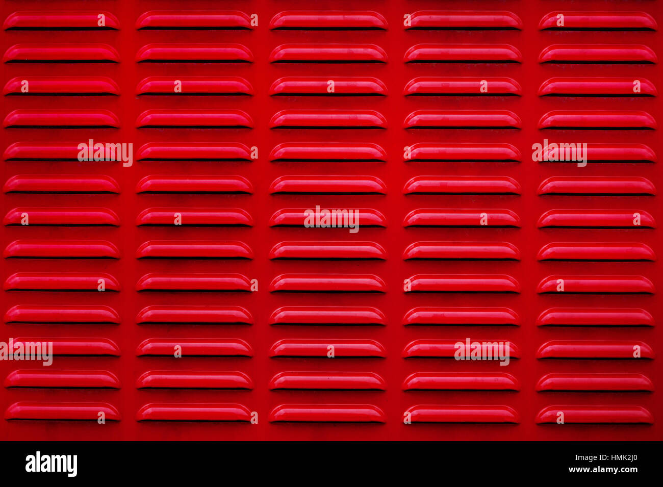 Red grille texture. Abstract mesh Stock Photo - Alamy
