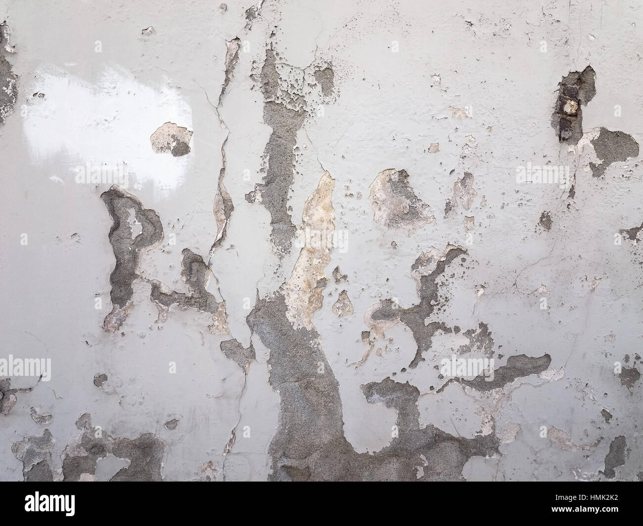 Damage caused by damp and moisture on a wall Stock Photo - Alamy