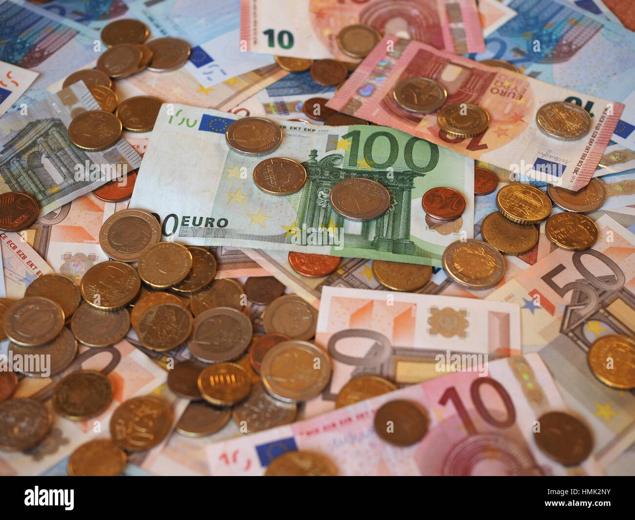 Euro (EUR) banknotes and coins, currency of European Union (EU Stock ...