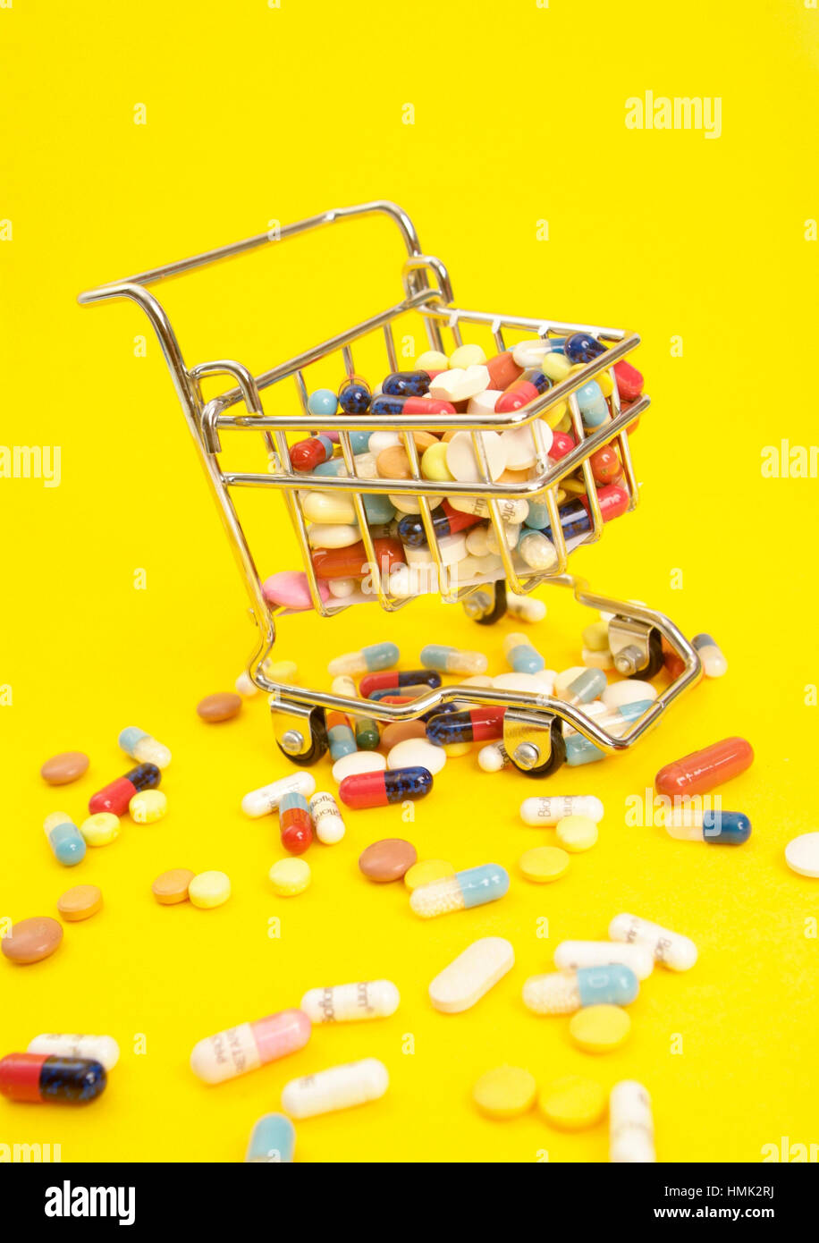 Symbolic consumption tablets hi-res stock photography and images - Alamy