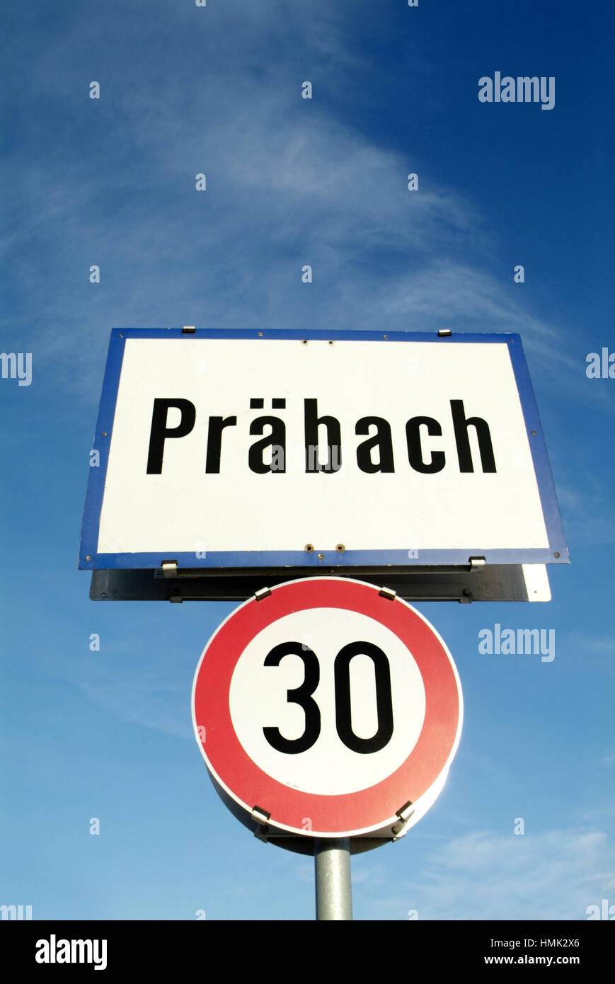 Town sign with speed restriction Stock Photo - Alamy