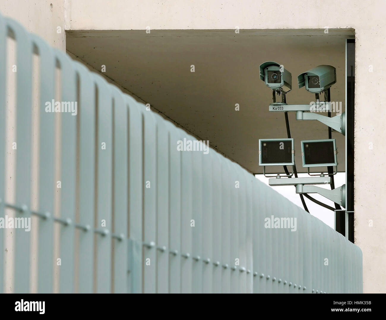 Surveillance camera on security fence hi-res stock photography and ...