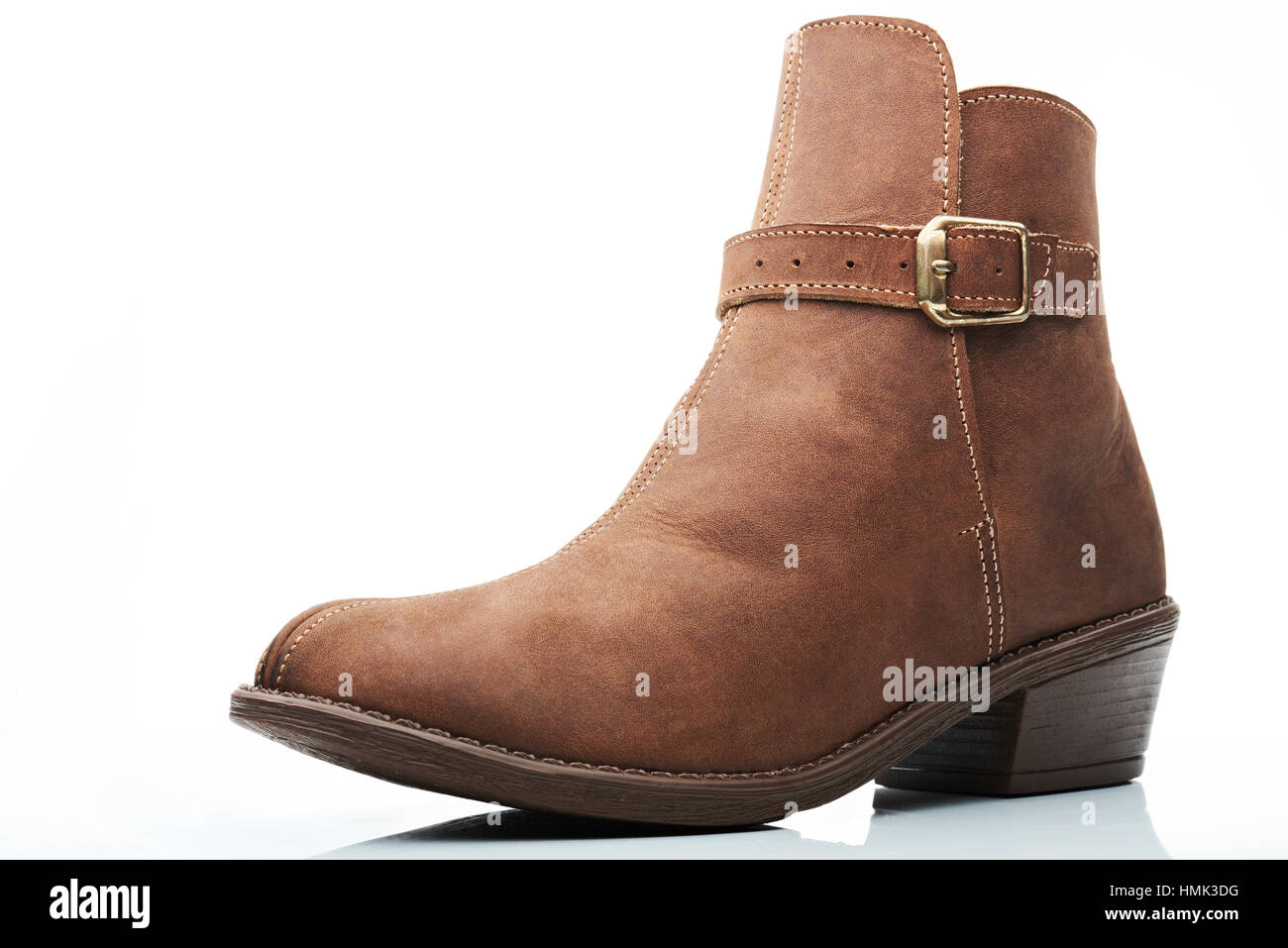 light brown ankle female boot on white background Stock Photo - Alamy