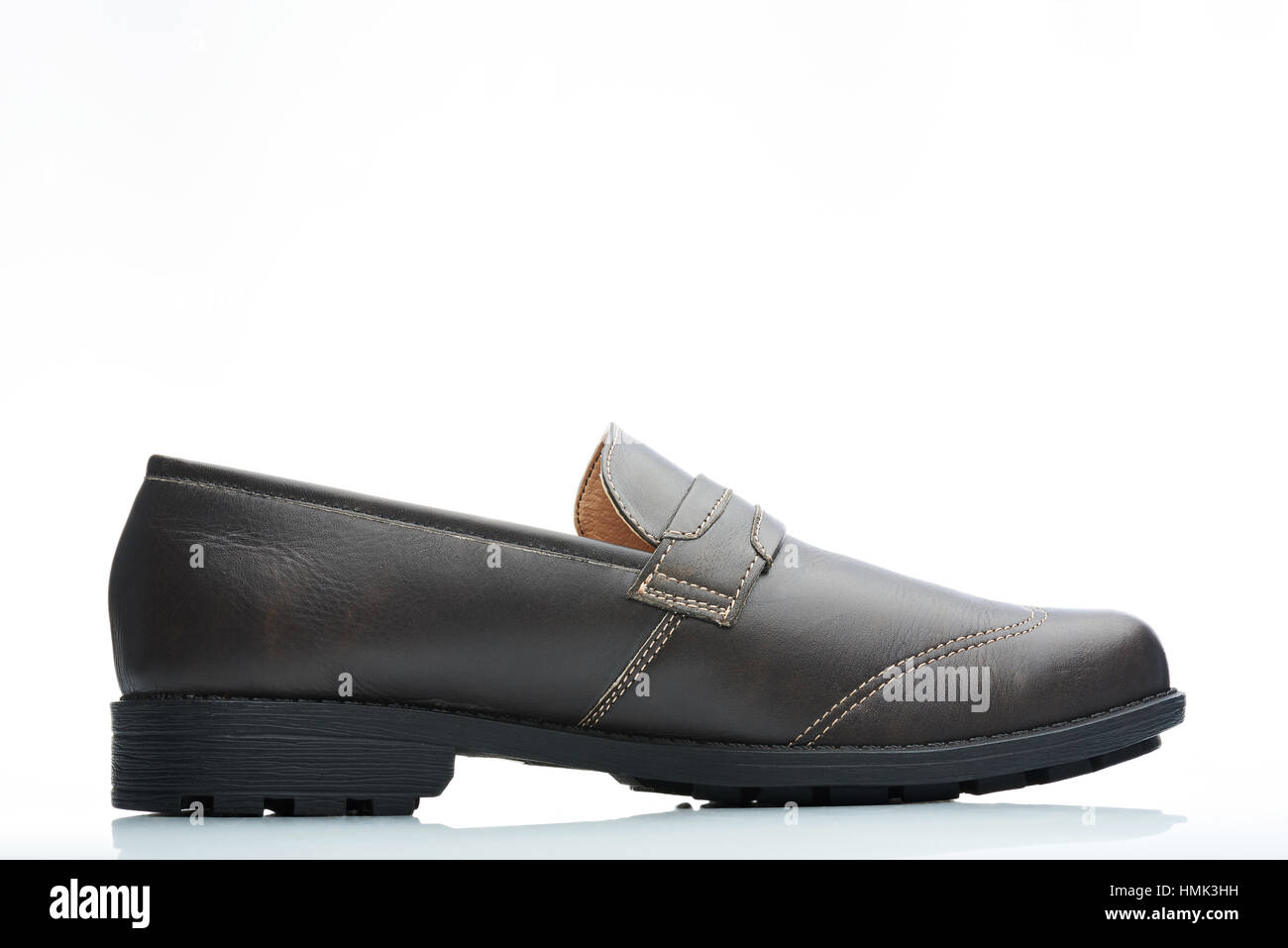 dark brown side view leather shoe catalog style Stock Photo - Alamy