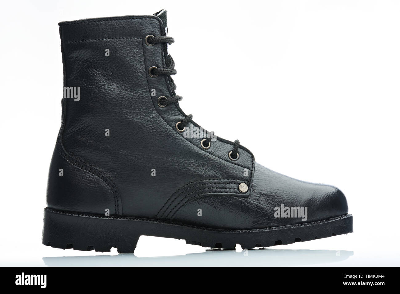 side view black leather men boot on white background Stock Photo - Alamy