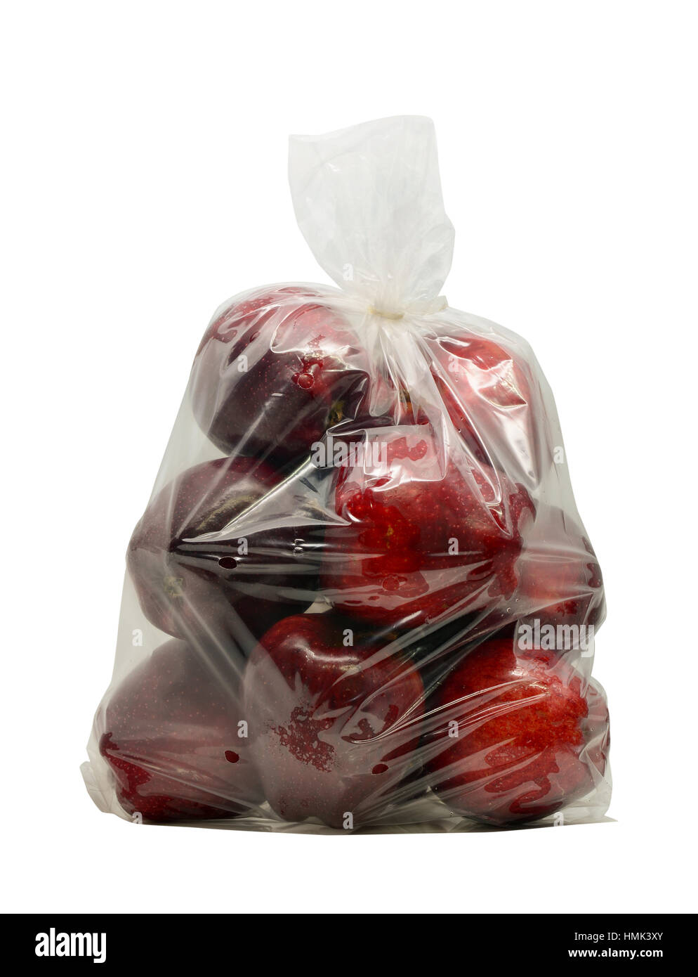 Red apples in plastic bag isolated on white with clipping path Stock ...