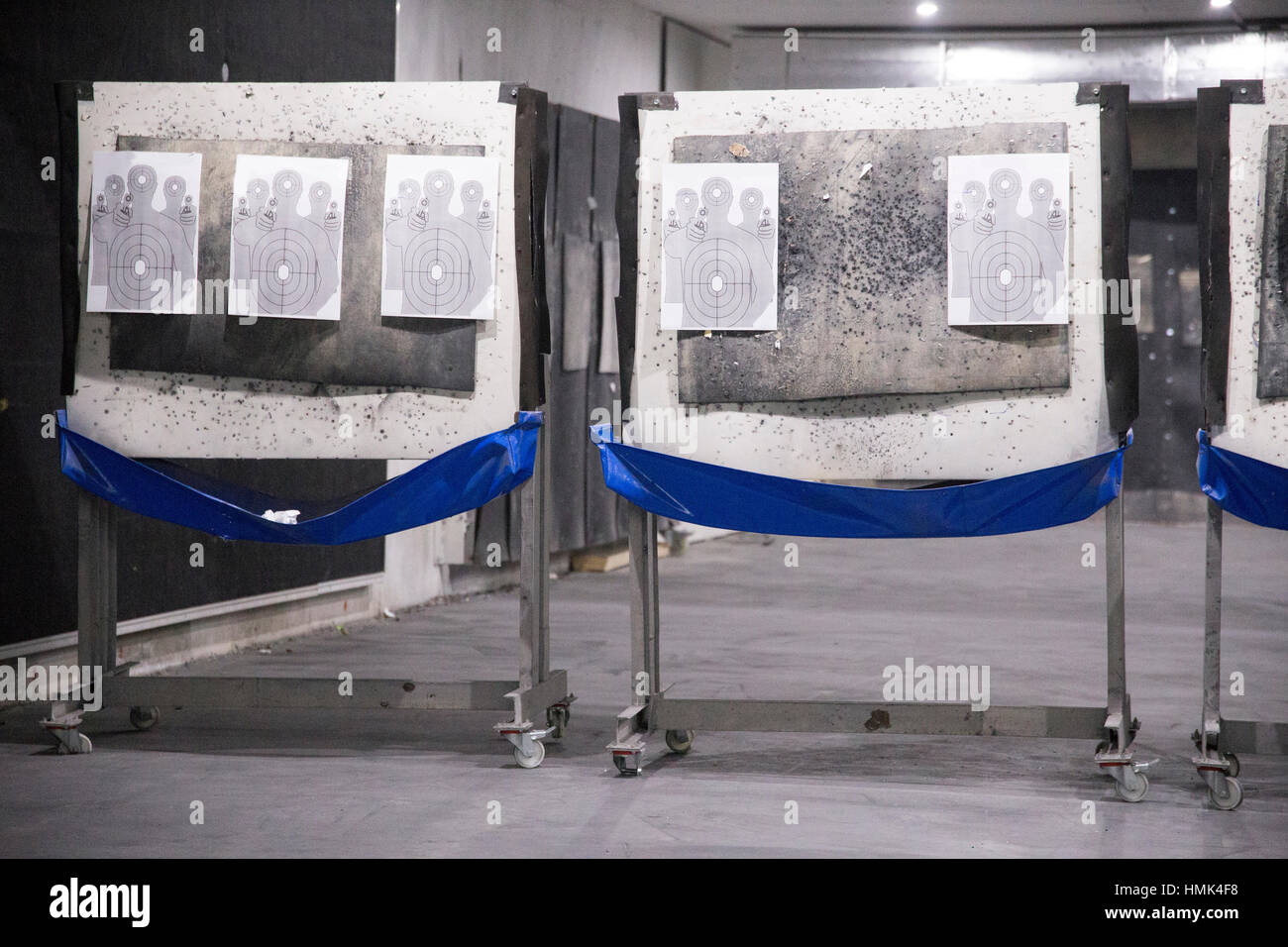 Targets for shooters at indoor shooting range underground Stock Photo ...