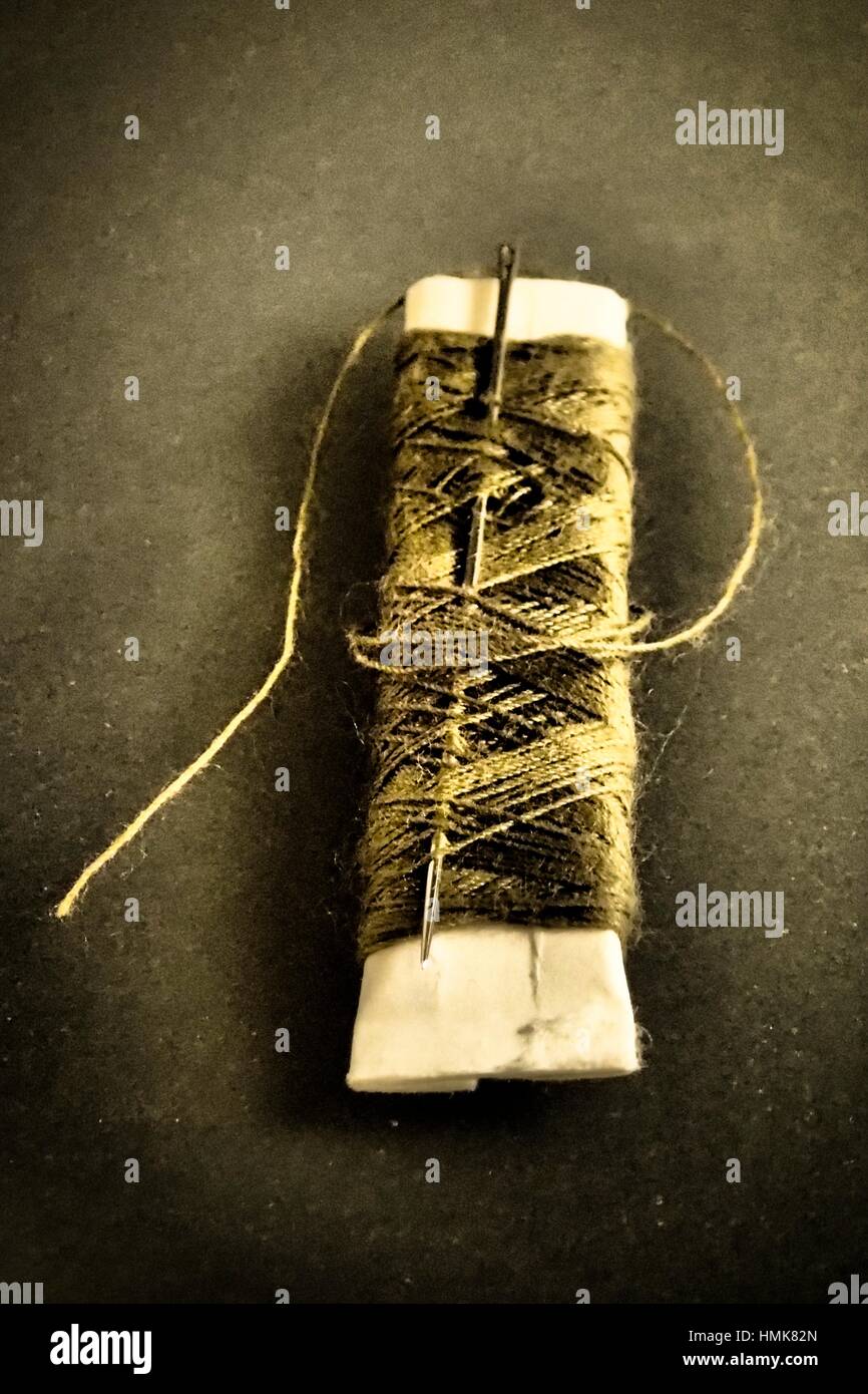 Needle and thread Stock Photo - Alamy