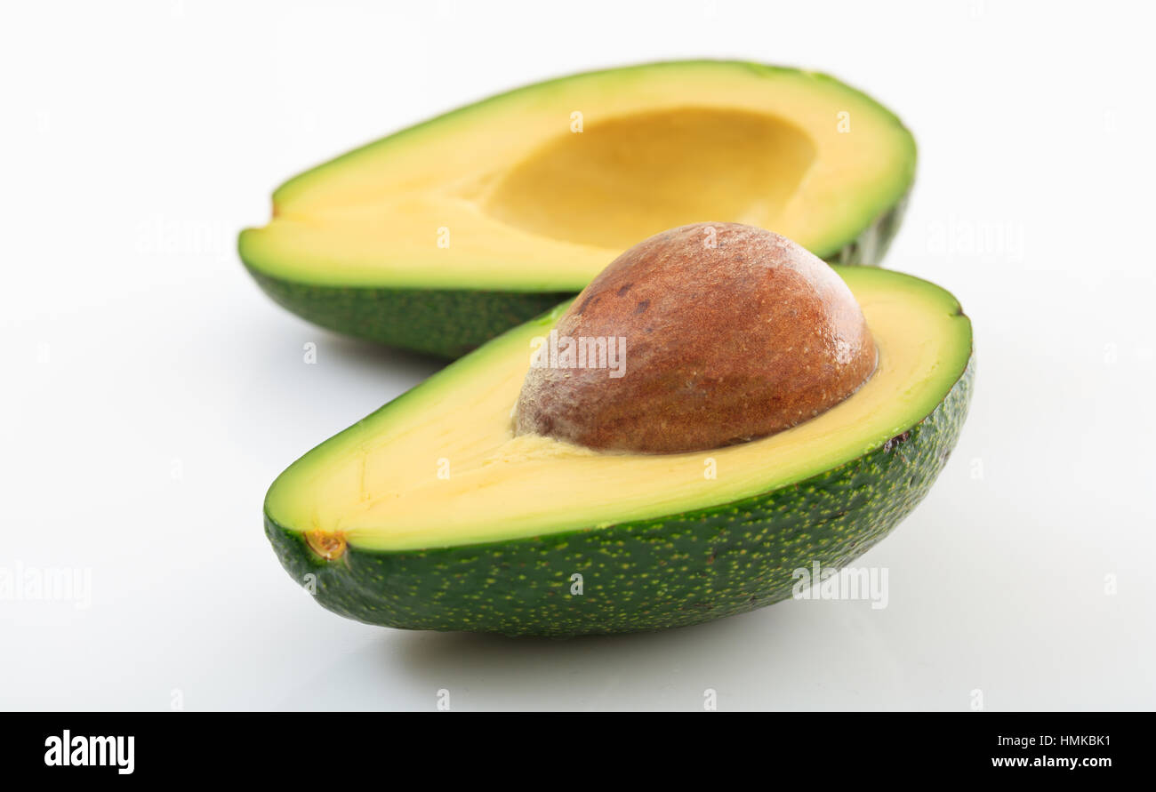 Avocado close up isolated on white background Stock Photo - Alamy