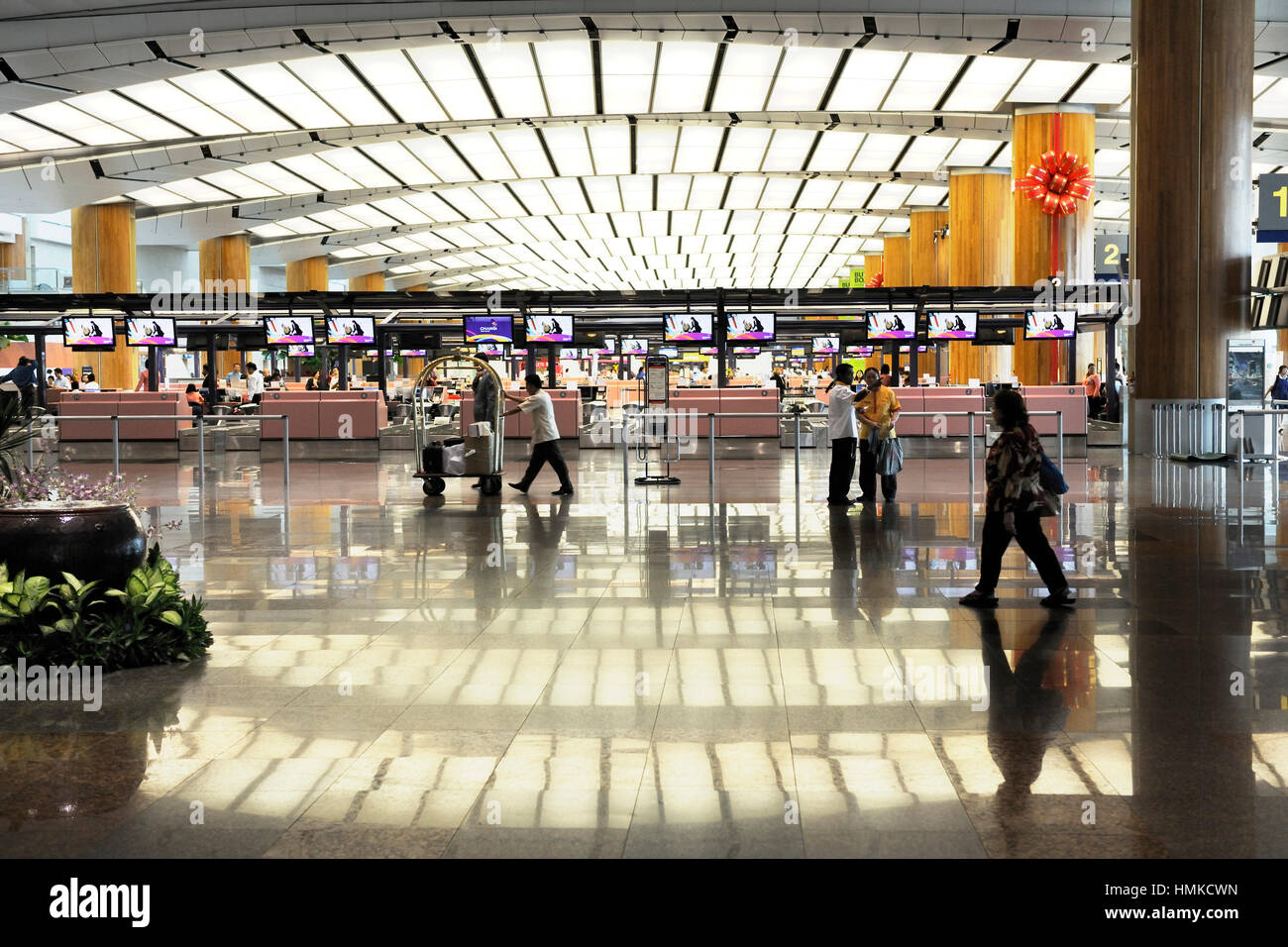check-in desks in Singapore Changi Terminal2 Stock Photo - Alamy