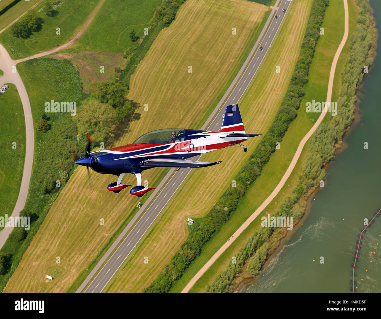 Aeroplane flying over road hi-res stock photography and images - Alamy
