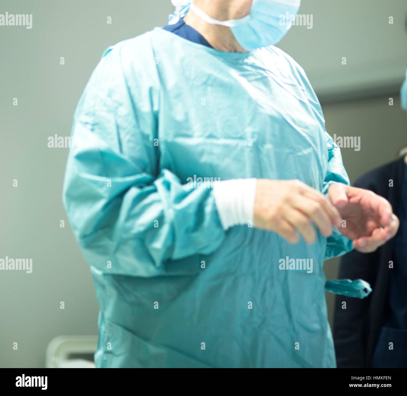 Surgeon in hospital surgery in sterile uniform "scrubs" in operating ...
