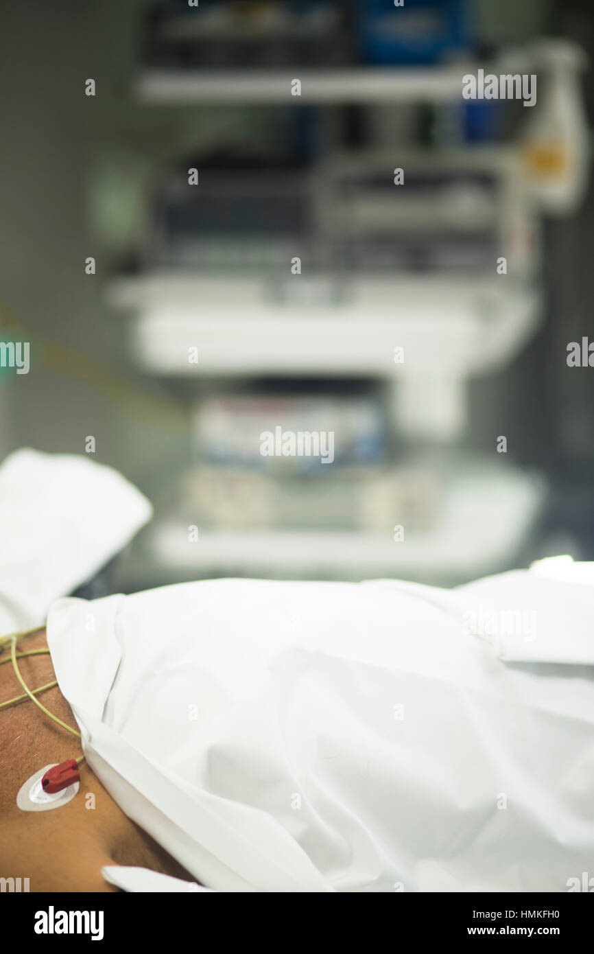 Hospital ward emergency room operating theater, patient bed and modern ...