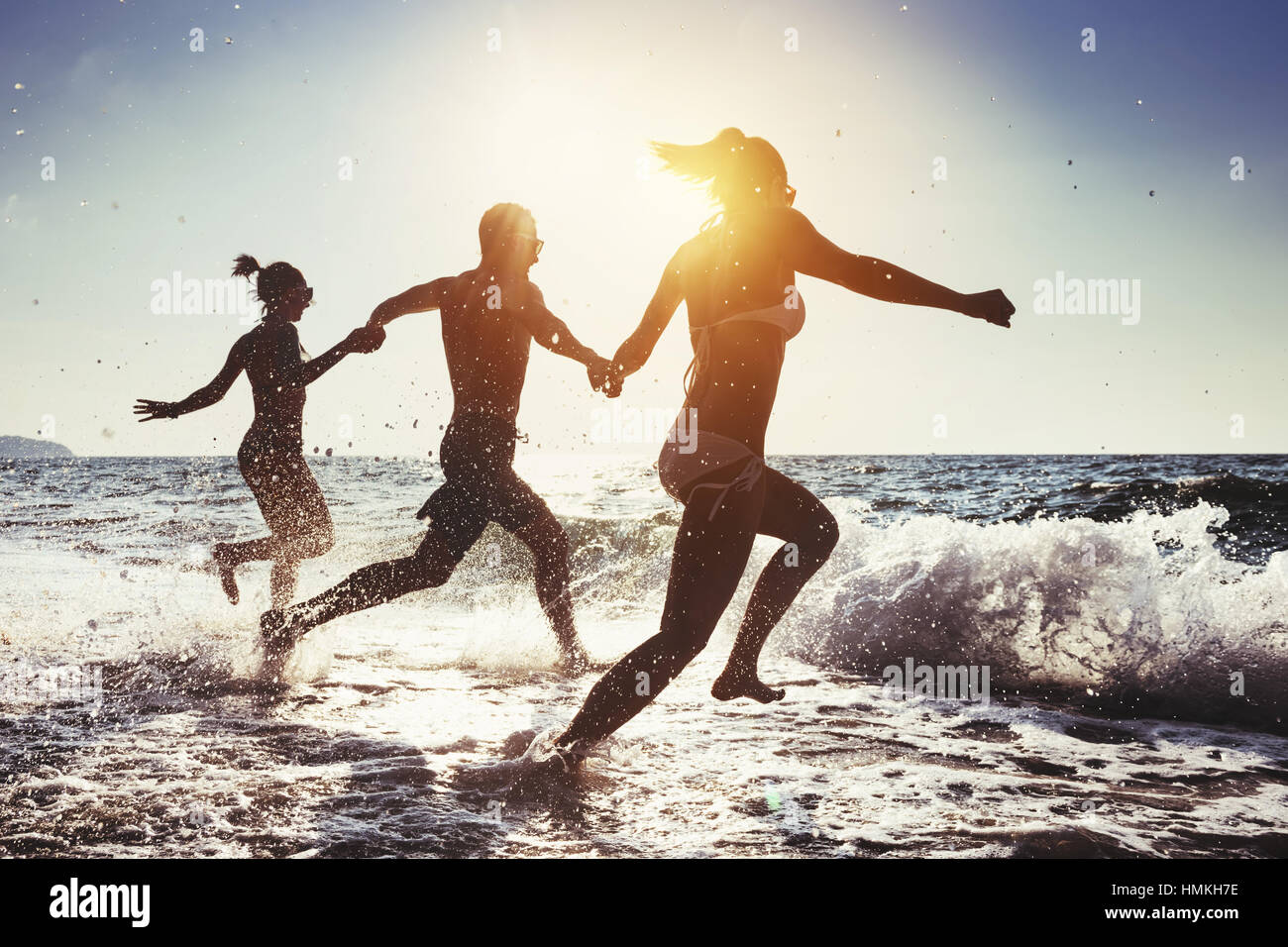 Happy people ocean sea hi-res stock photography and images - Alamy