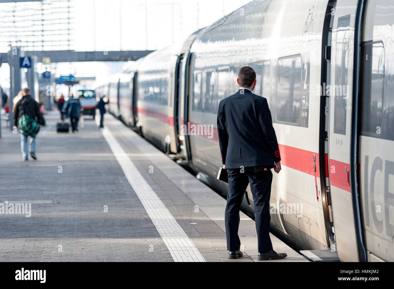 Train Guard gives Sign for Departure, Railways Station, Munich, Germany ...