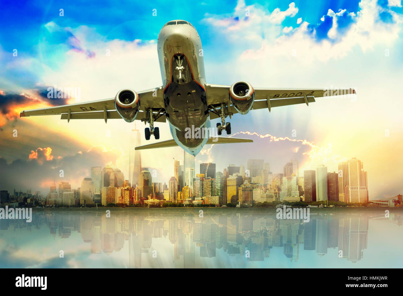 aircraft taking off on sunrise and skyscrapers background Stock Photo ...