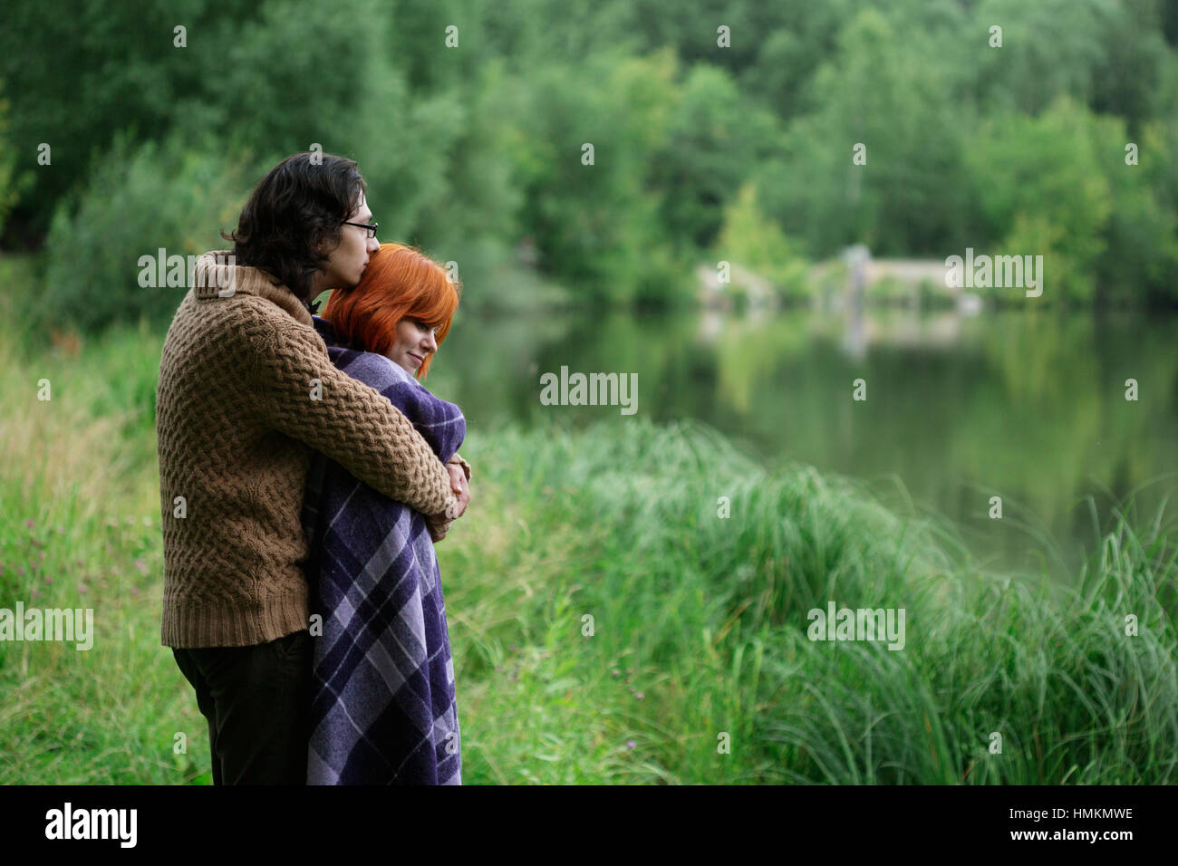 Romantic loving couple resting at the nature near water Stock Photo - Alamy