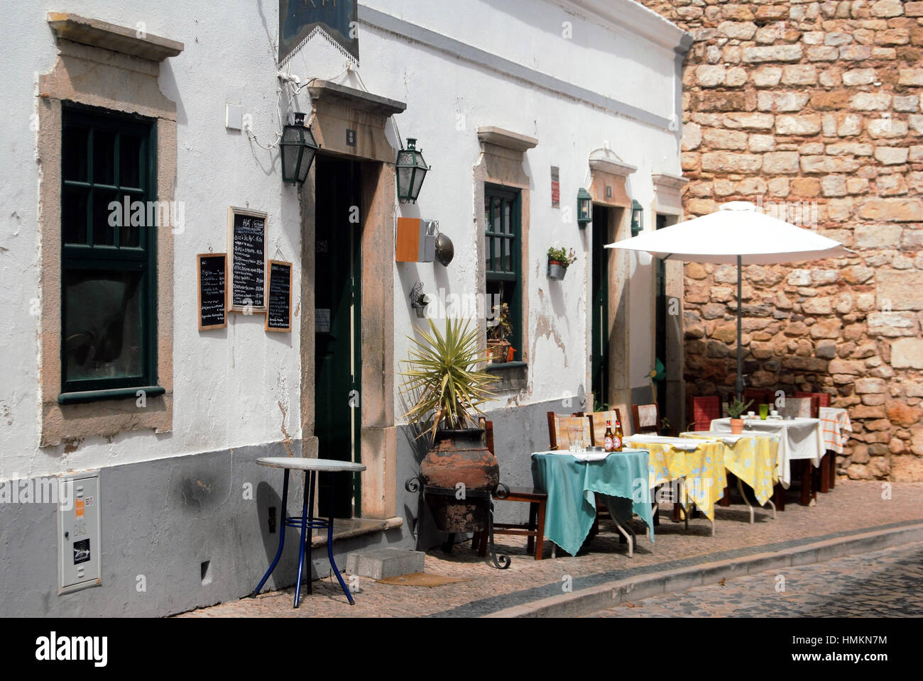 European restaurant in Portugal table and chairs outside Stock Photo ...