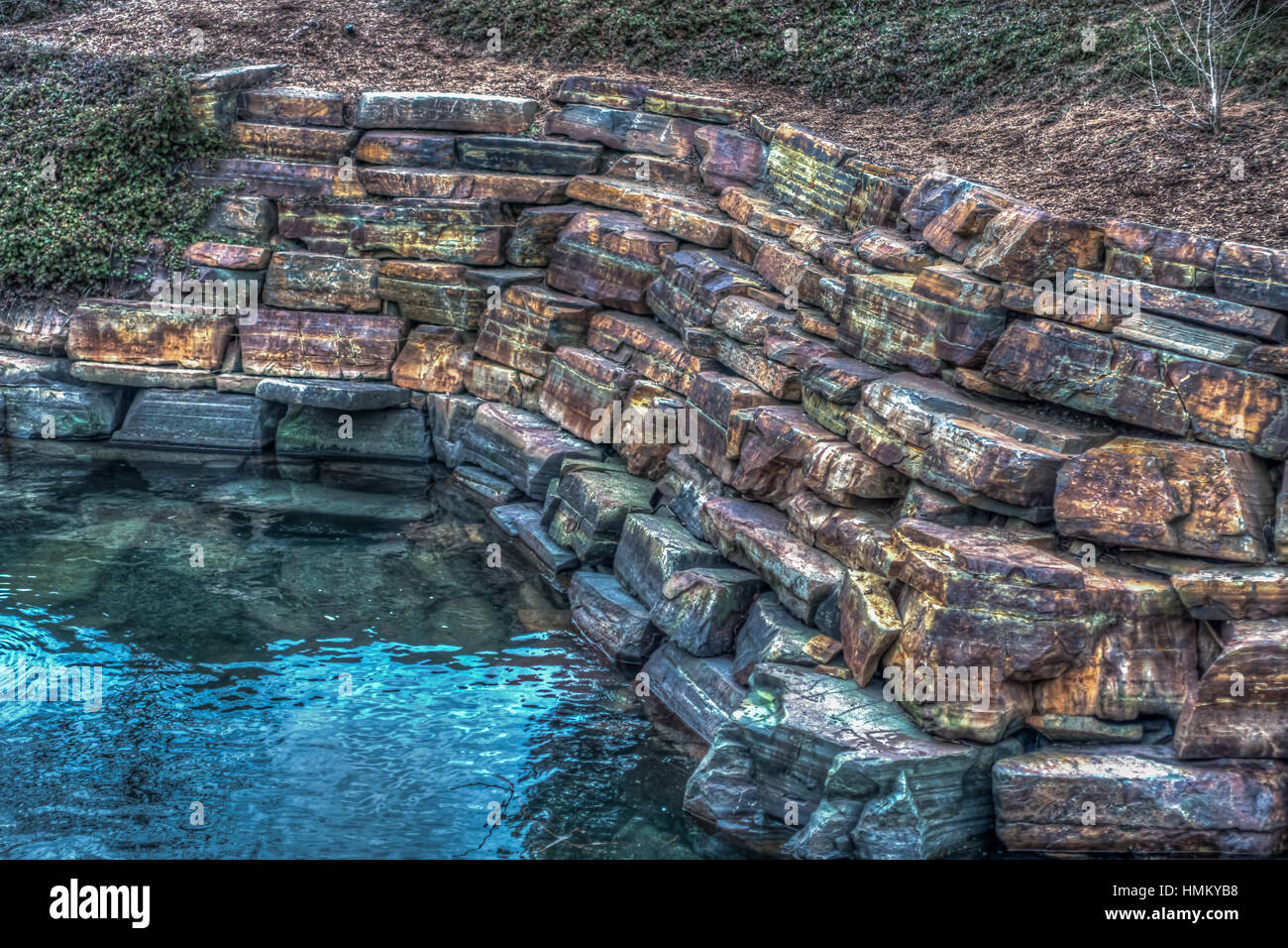 HDR image of a wall by a pond that looks radioactive. HDR image Stock ...