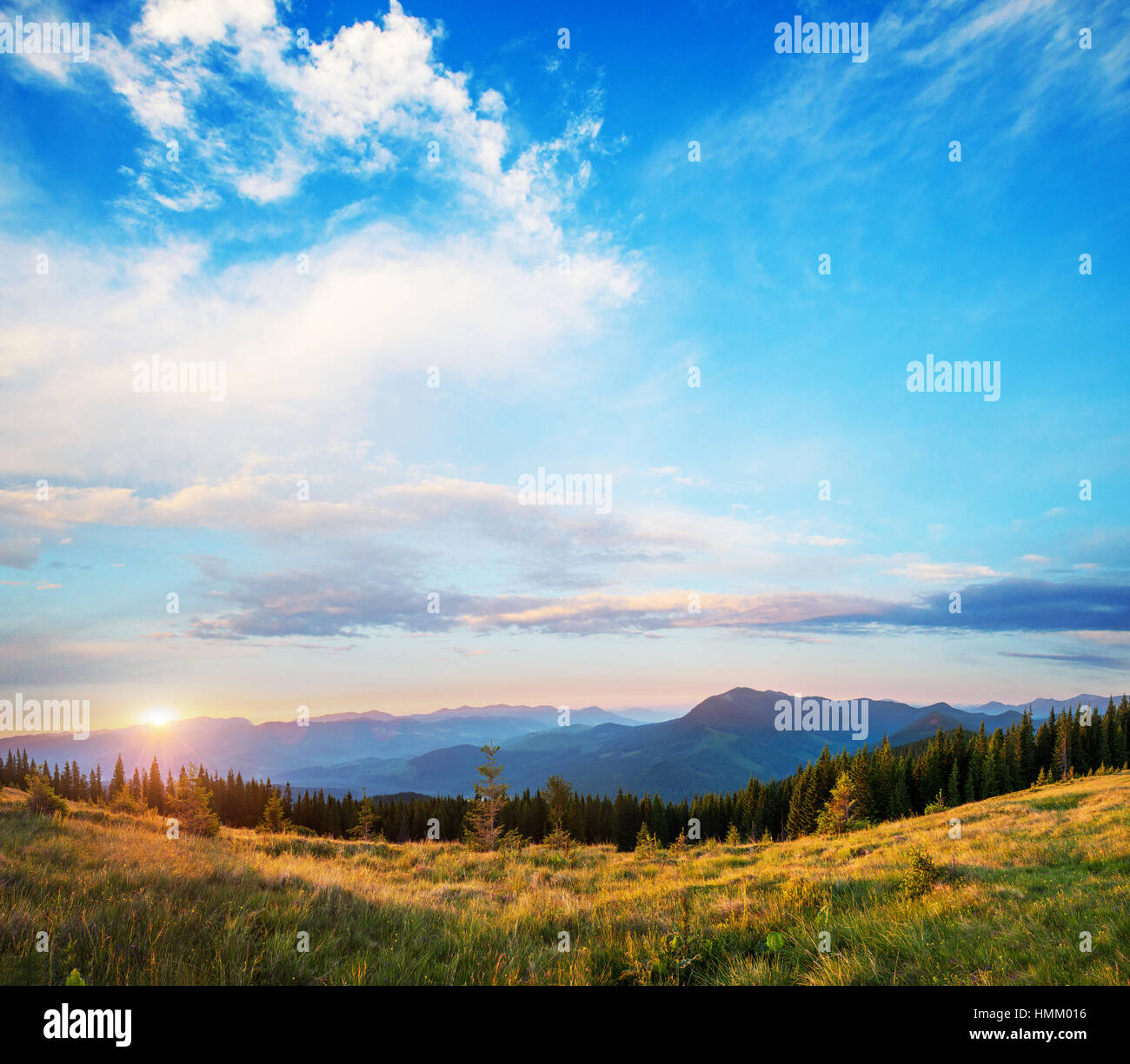 Sunset in the mountains landscape Stock Photo - Alamy