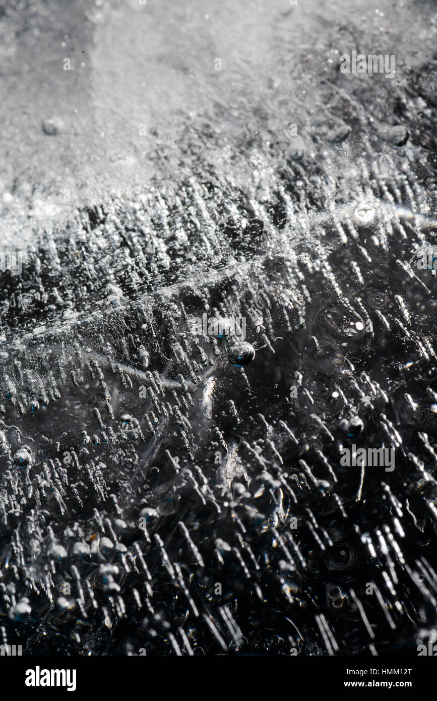 Ice with water bubbles close-up Stock Photo - Alamy