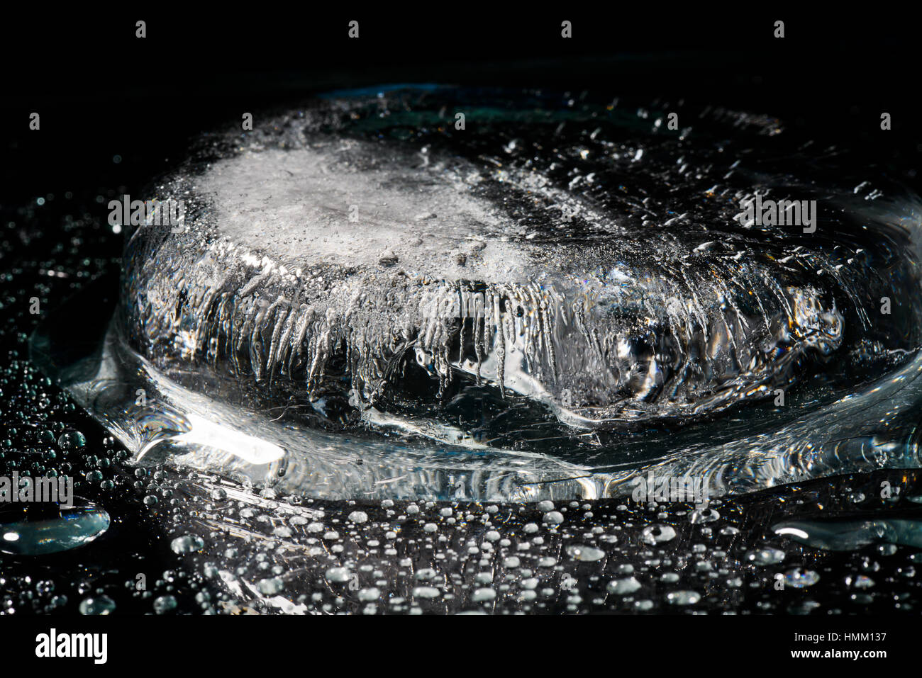 Ice with water bubbles close-up Stock Photo - Alamy