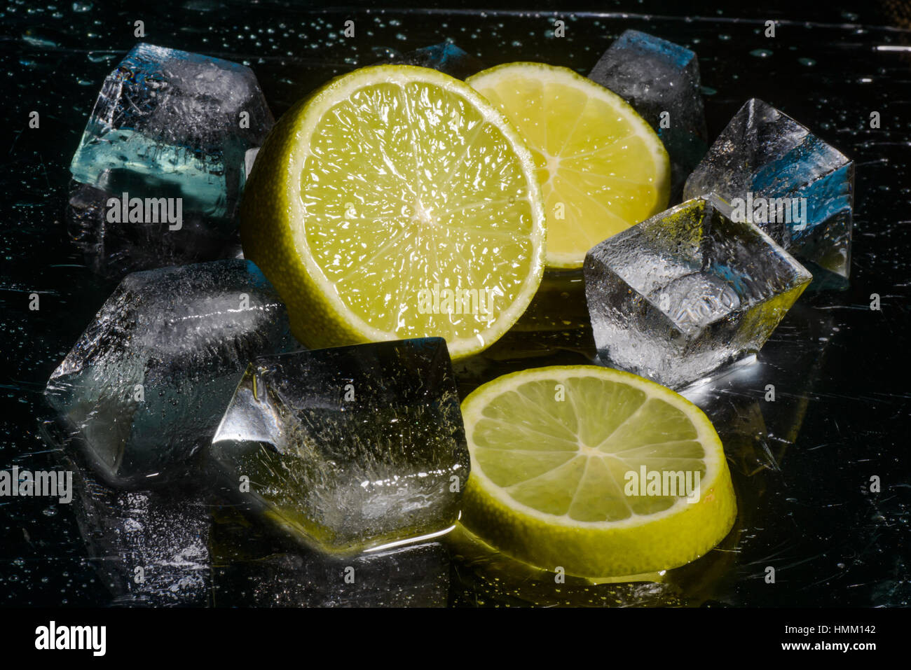 Freshness lime and cristal cube of ice Stock Photo - Alamy