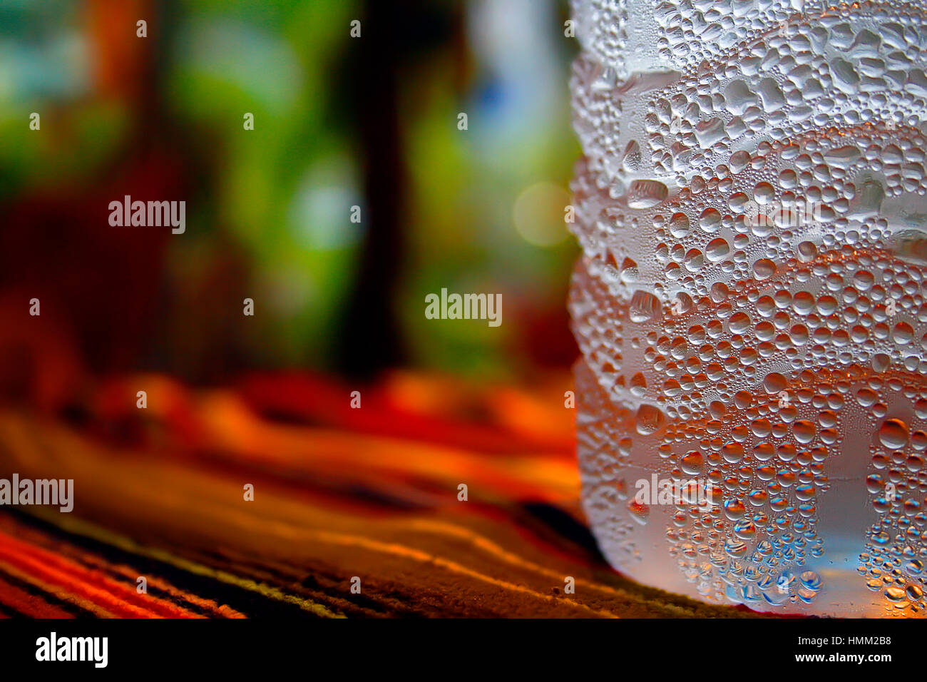 Bottle of water droplets sweat asia background Stock Photo - Alamy