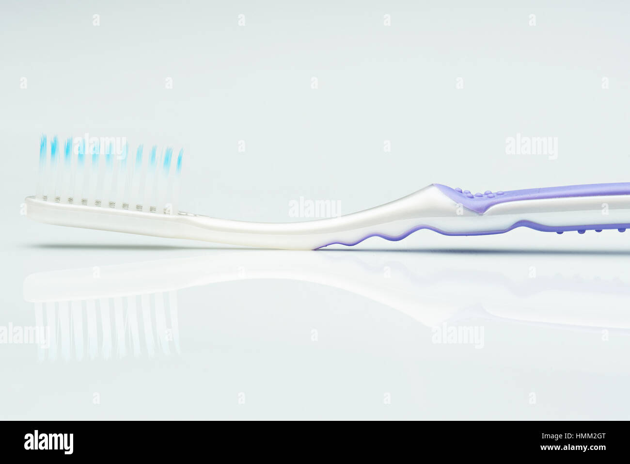 Purple toothbrush hi-res stock photography and images - Alamy