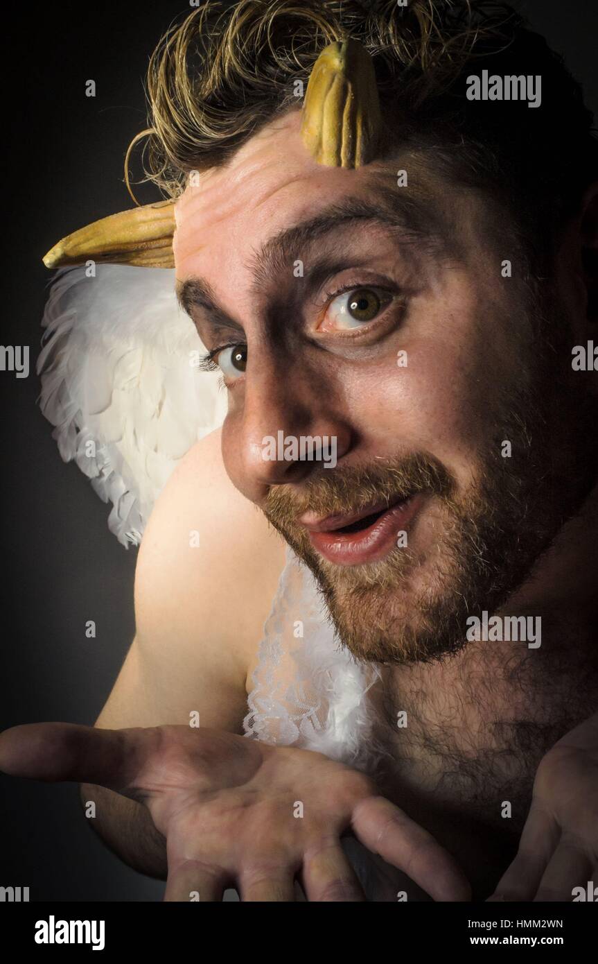 Fallen angel satan with feathered wings and moody lighting Stock Photo ...