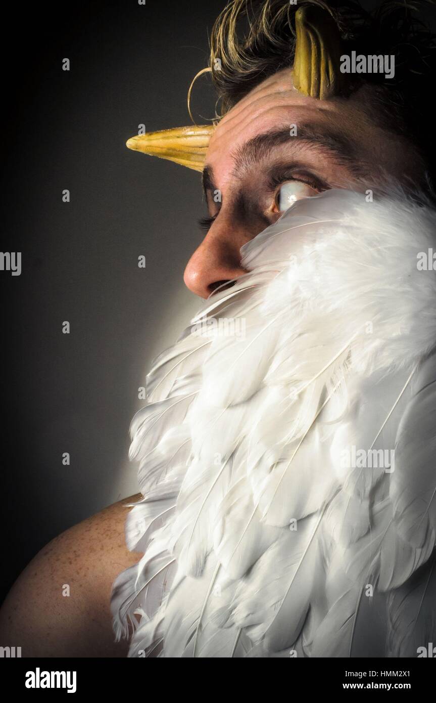 Fallen angel satan with feathered wings and moody lighting Stock Photo ...