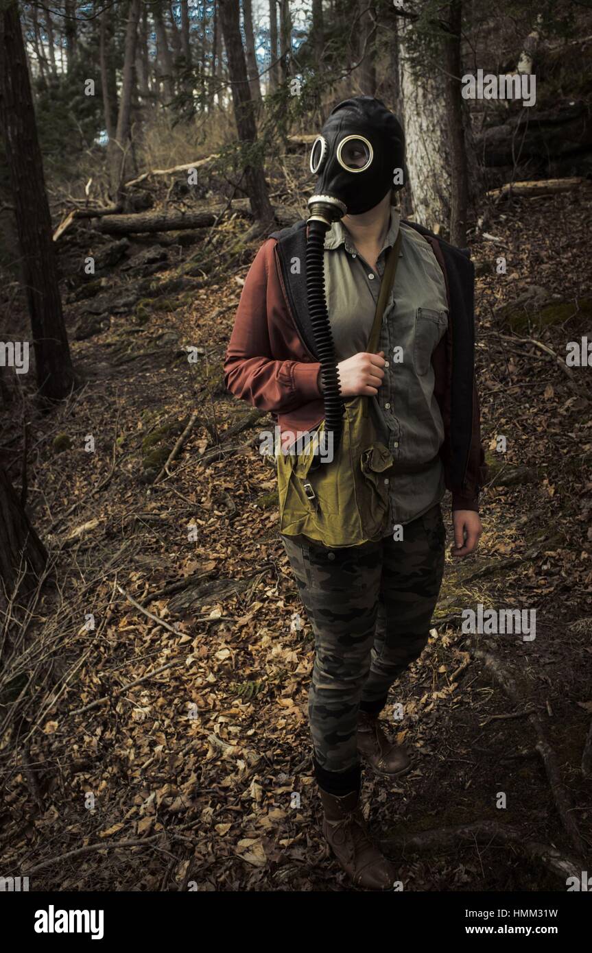 Scary girl wearing authentic Russian gas mask with breathing hose Stock ...