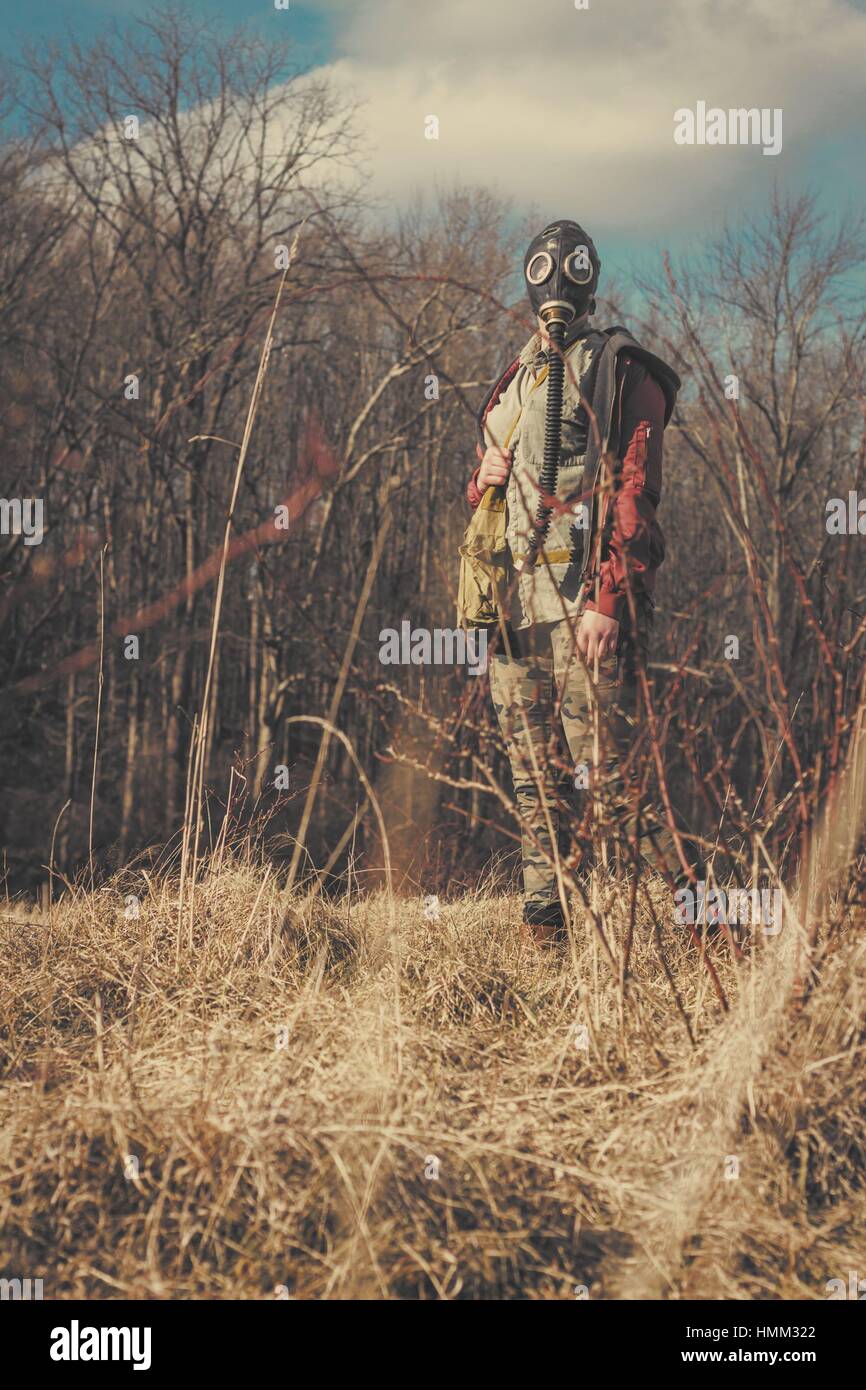 Scary girl wearing authentic Russian gas mask with breathing hose Stock ...