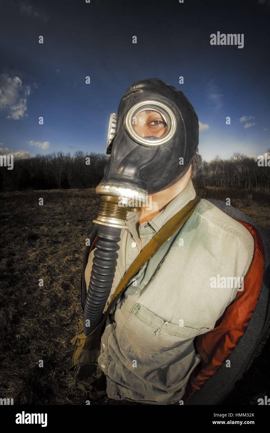 Scary girl wearing authentic Russian gas mask with breathing hose Stock ...